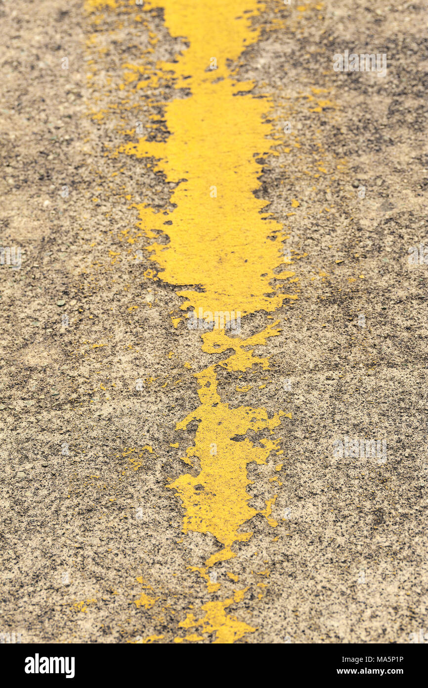 Old yellow paint marks on the cement floor Stock Photo - Alamy