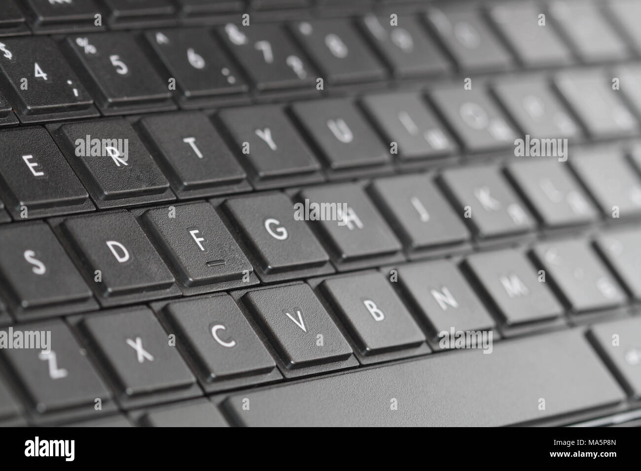 Closeup of black modern computer laptop keyboard Stock Photo - Alamy