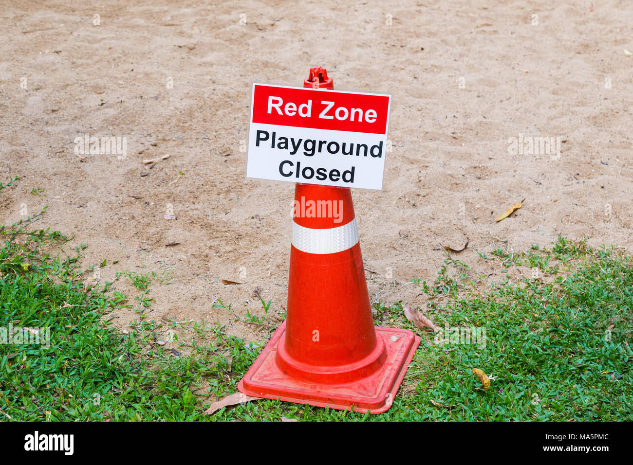Red Zone Playground Closed sign posting at a children playground during ...