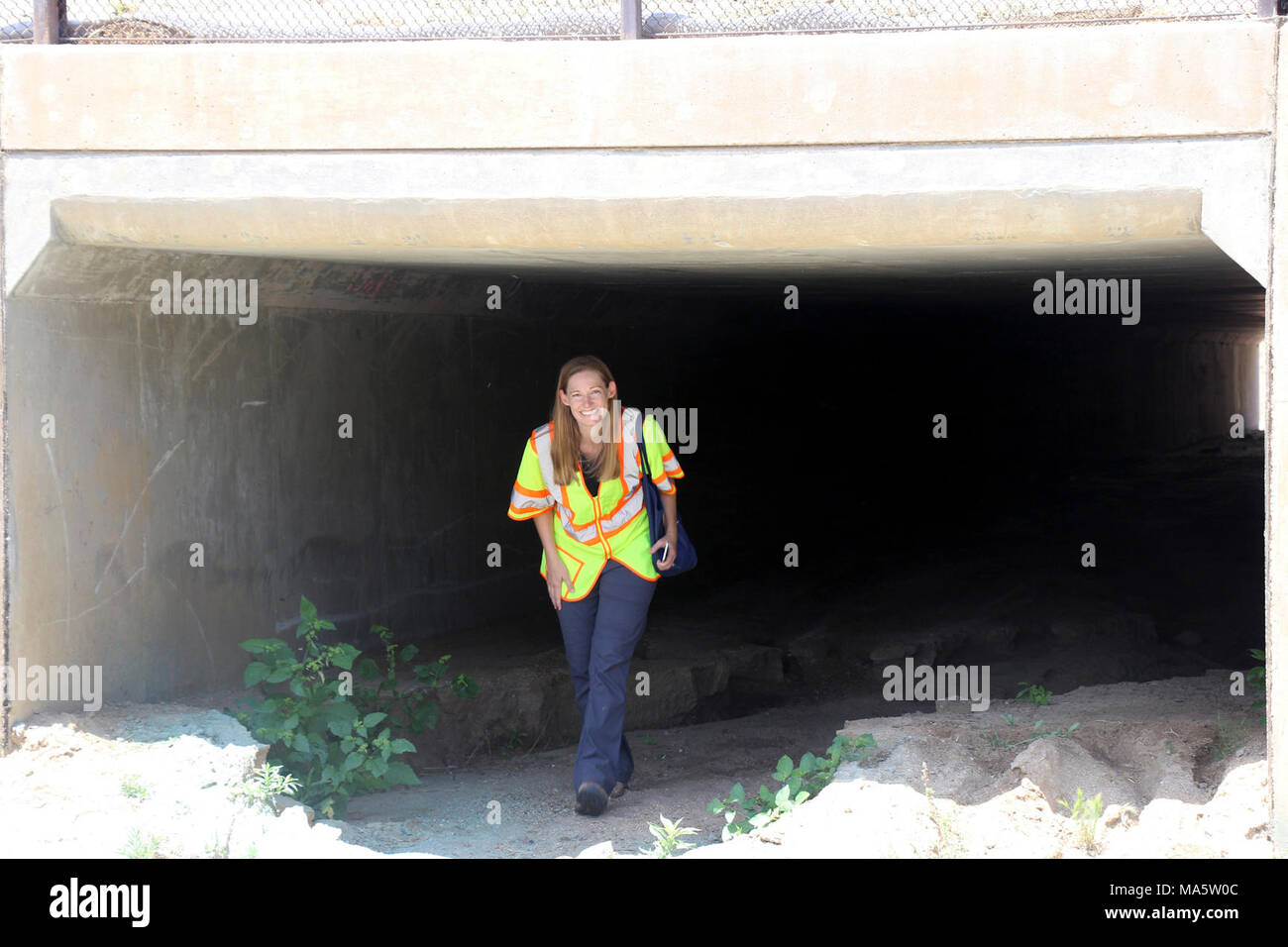USFWS Biologist Sally Brown in undercrossing along SR-76. USFWS ...