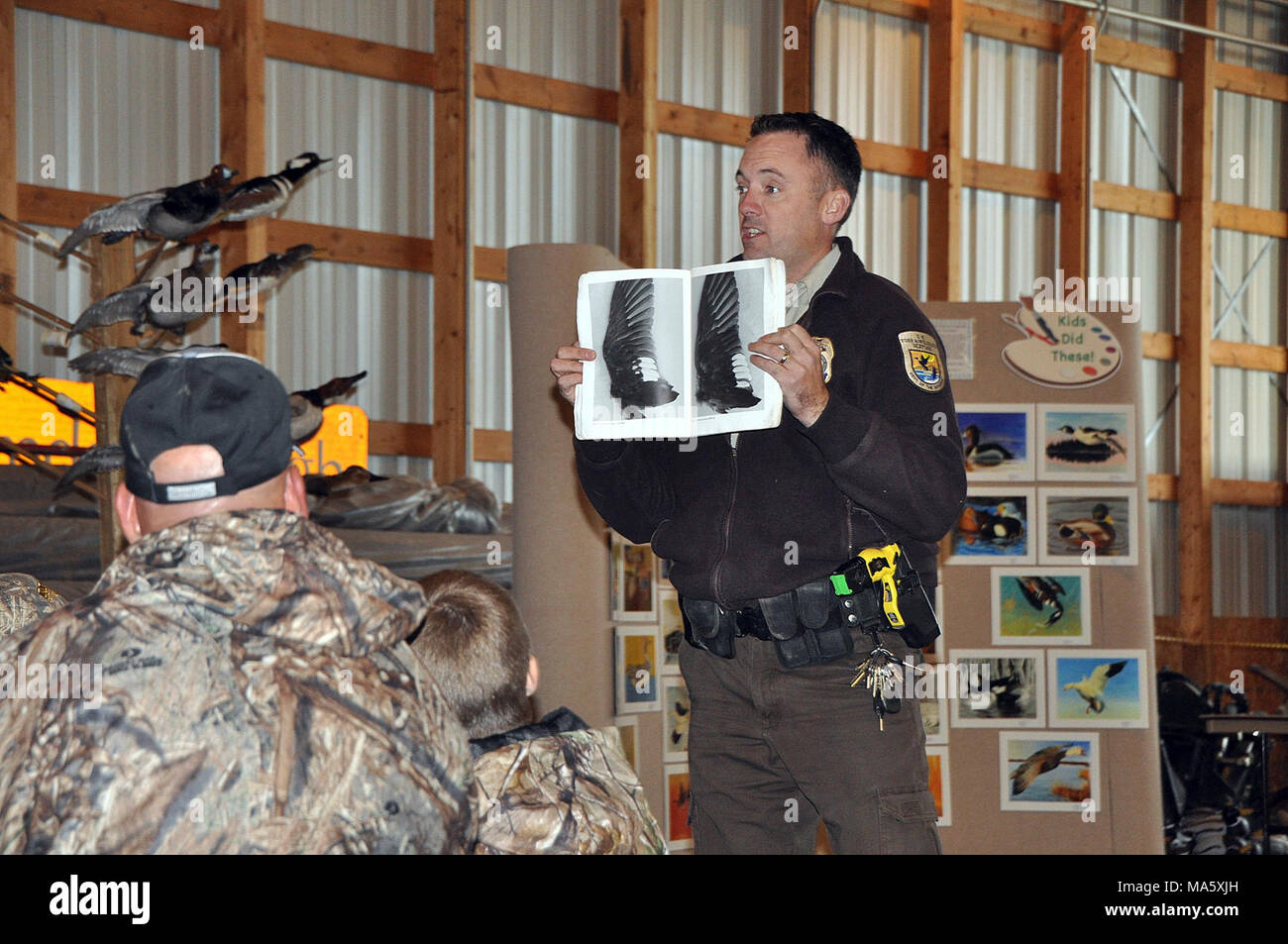 Refuge Officer Chuck Melvin. Refuge Officer Chuck Melvin teaches young ...