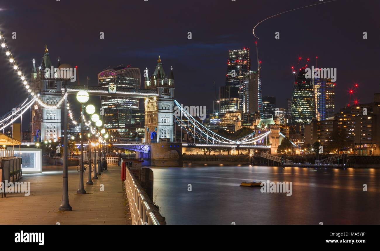 London - The Tower Bride, promenade and skyscrapers at dusk Stock Photo ...