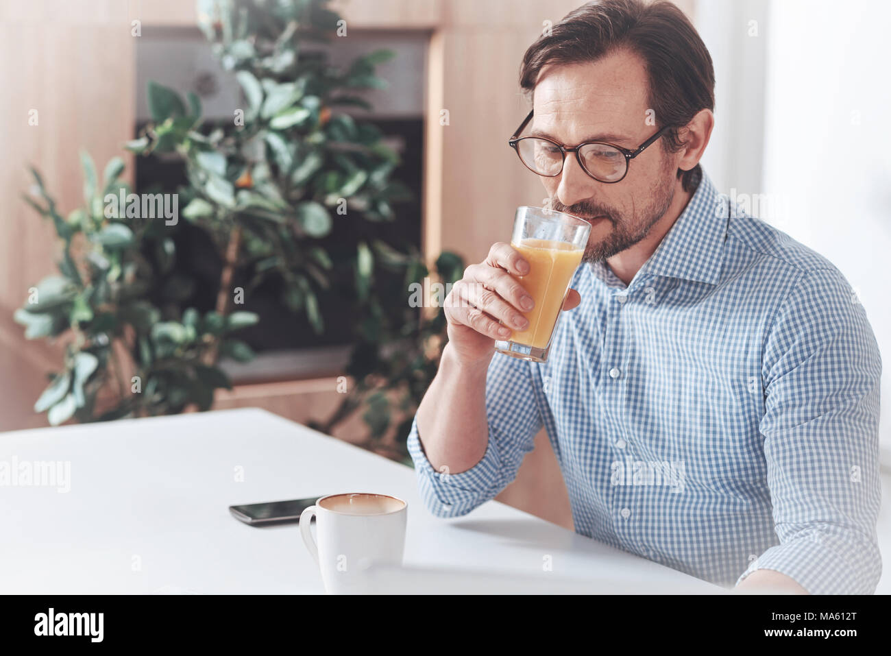 Man drinking juice hi-res stock photography and images - Alamy
