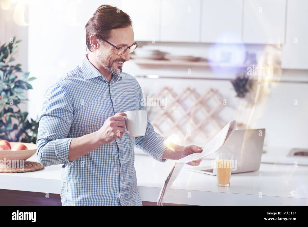 Man breakfast newspaper table hi-res stock photography and images - Alamy