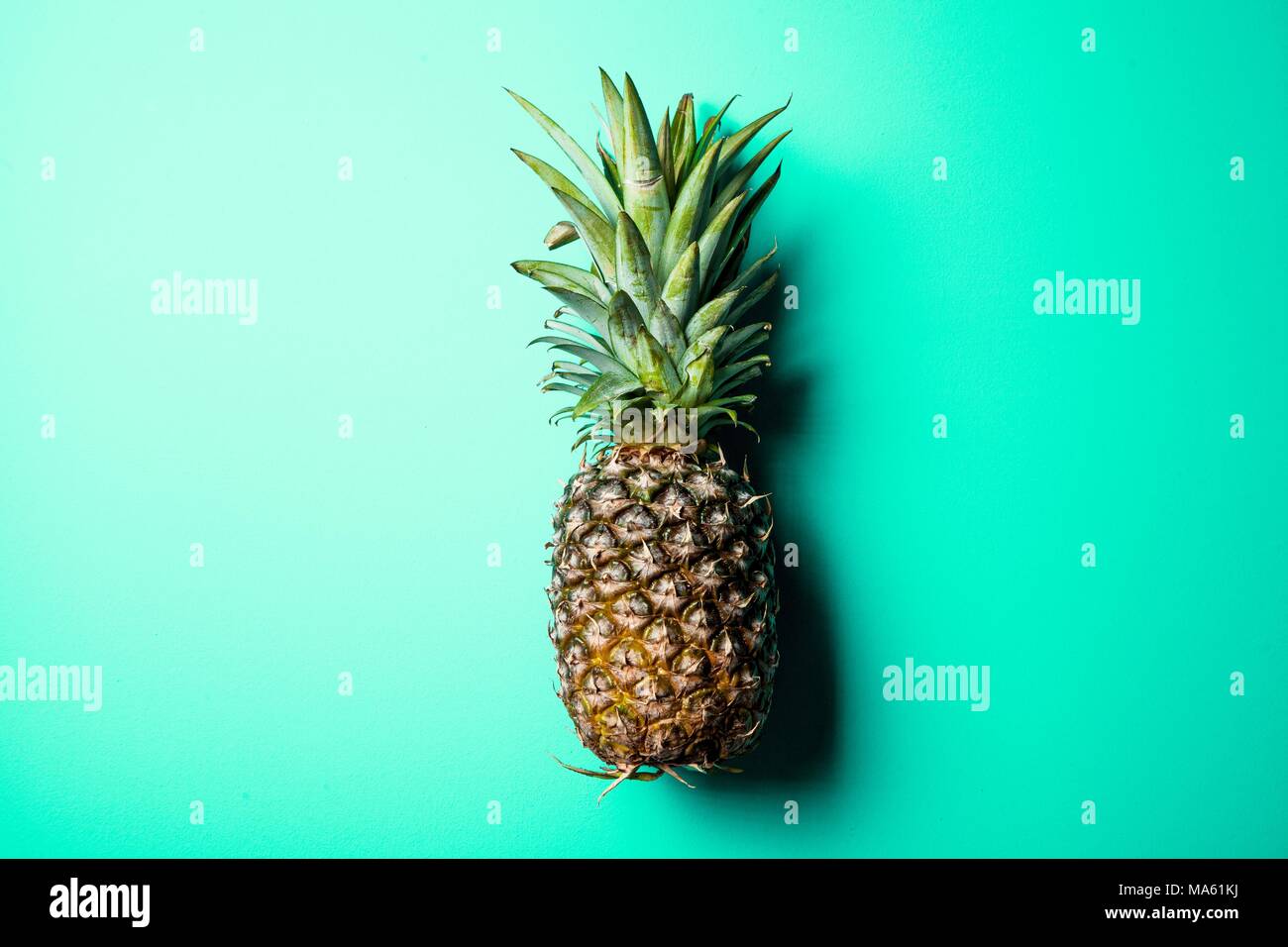 Fresh pineapple on color background Stock Photo - Alamy