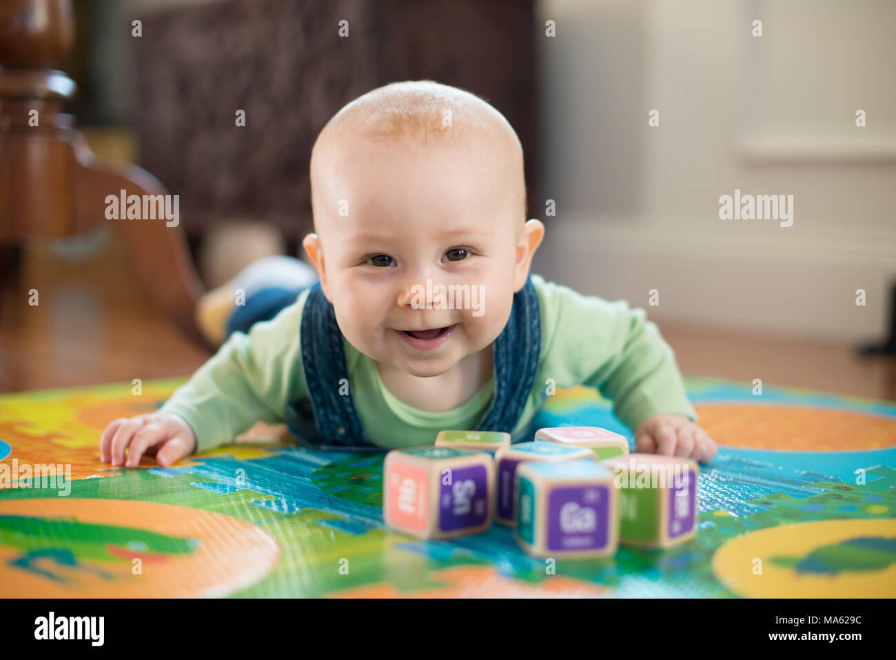 Baby play tummy hi-res stock photography and images - Alamy
