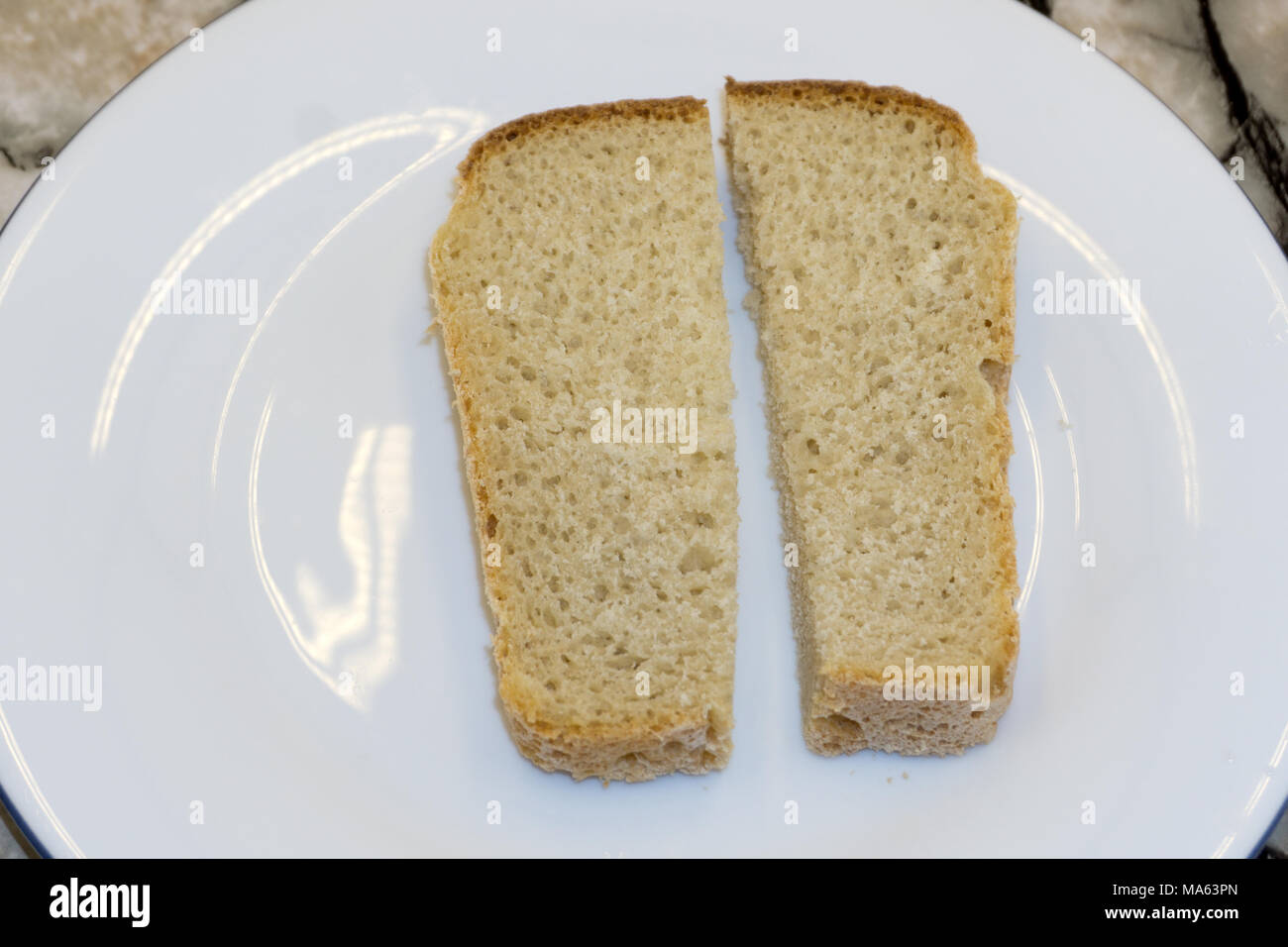 Two pieces slide of bread isolated on the white background Stock Photo ...