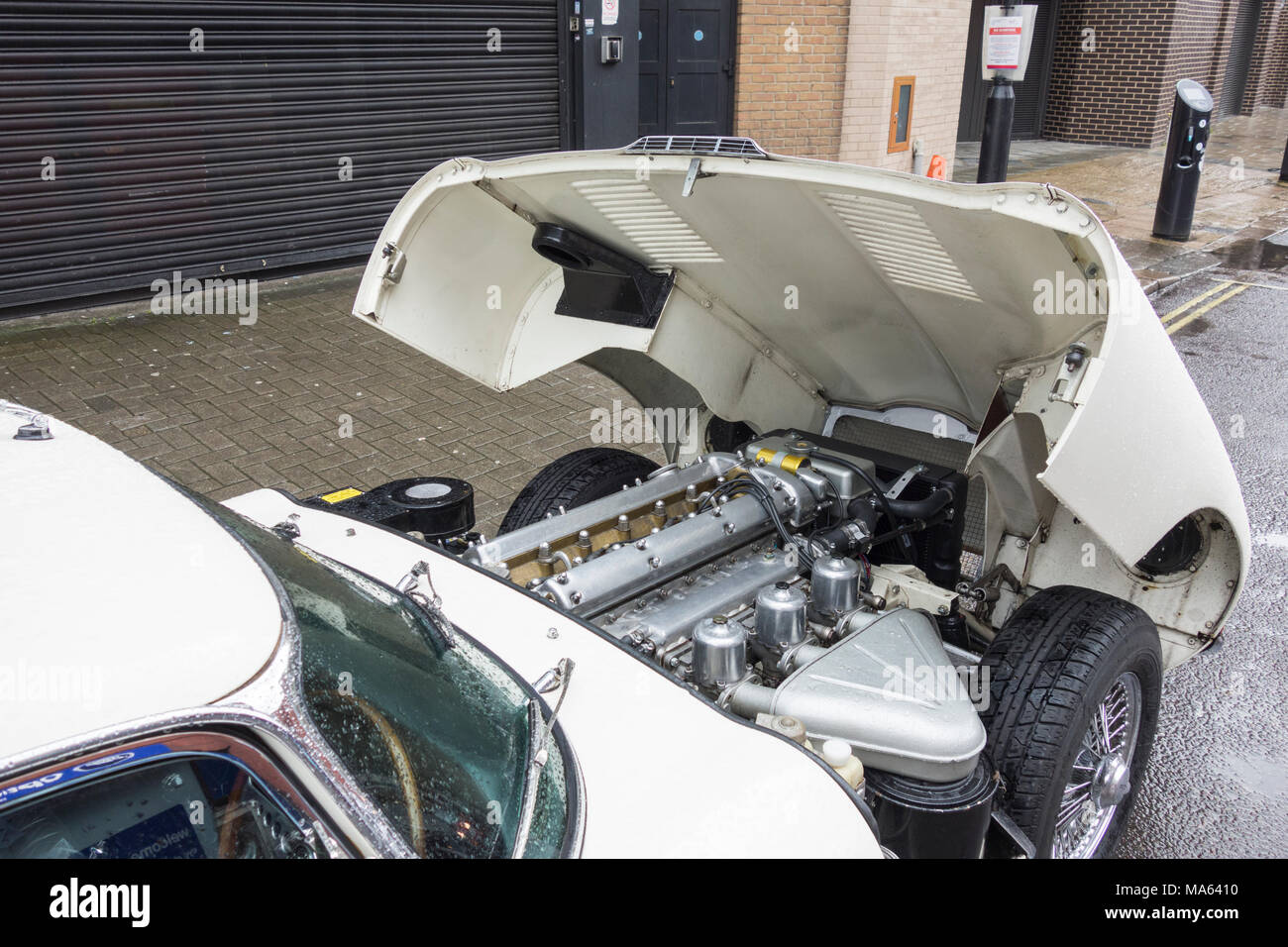 A broken down Jaguar E-type 4.2 litre classic sports car in London, UK ...