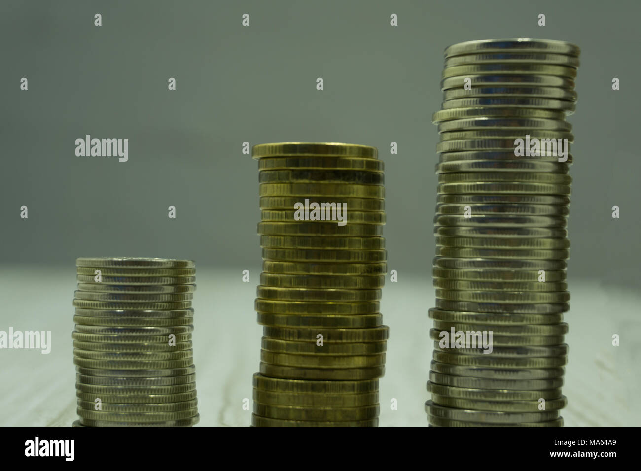 Young businessman with a black folder in hand running over a heap of ...