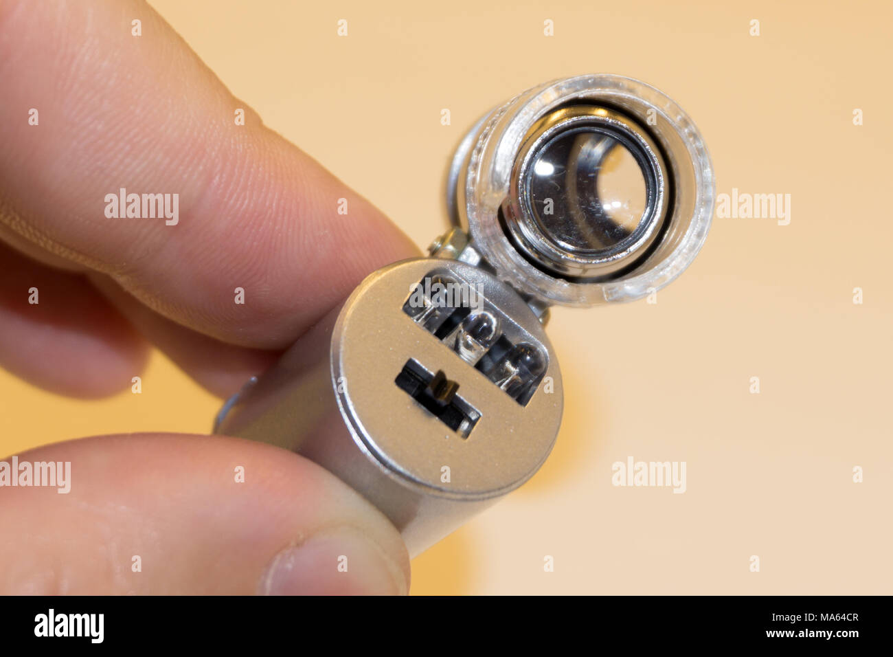 children's microscope of orange color isolated on white Stock Photo - Alamy