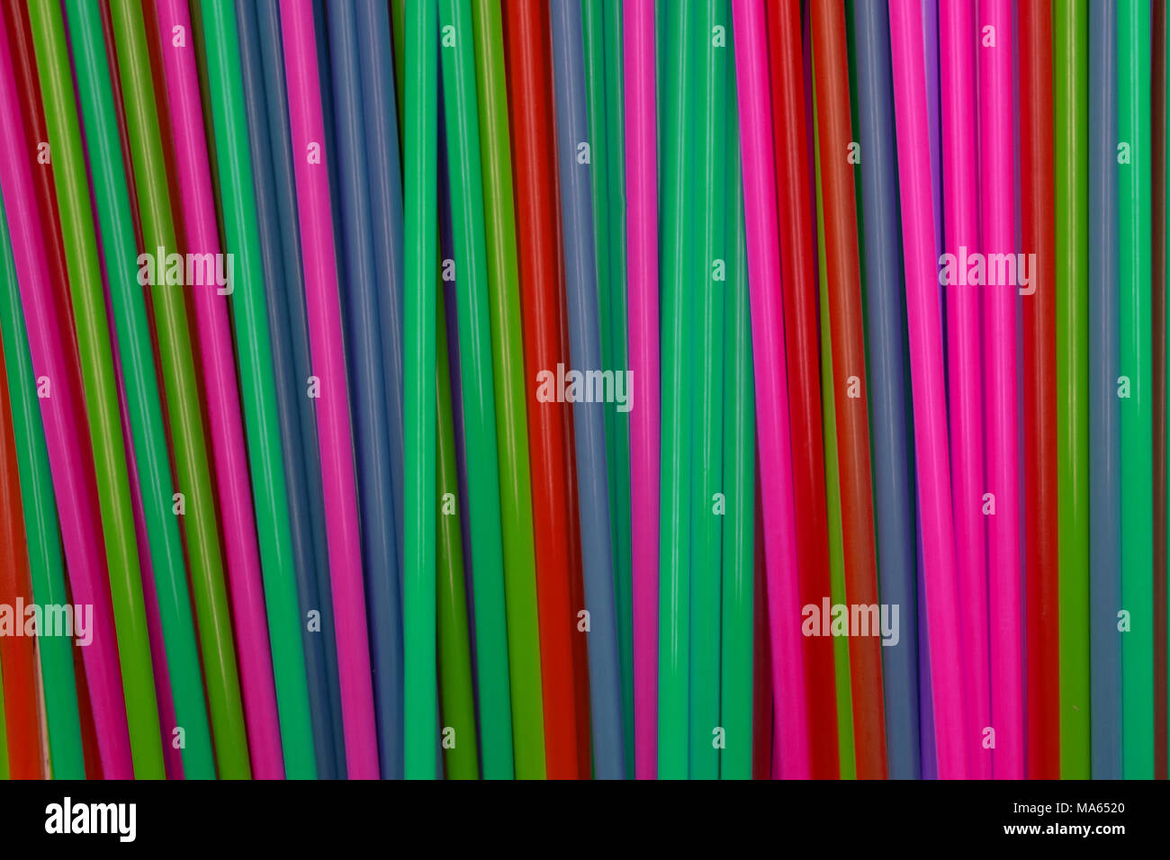 Multi color fabric in a row Stock Photo - Alamy