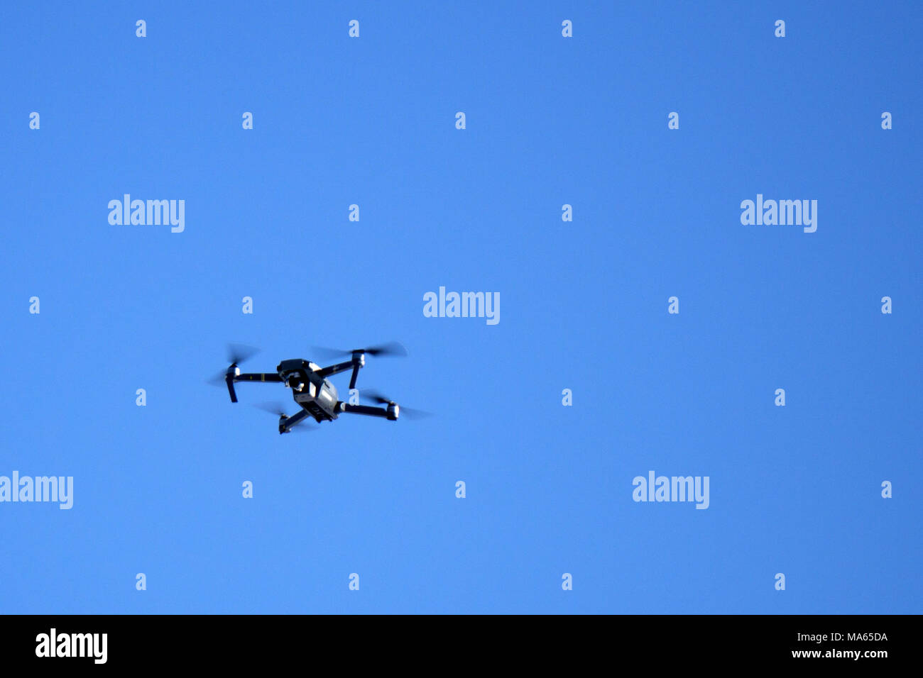 uav drone copter flying with digital camera Stock Photo - Alamy