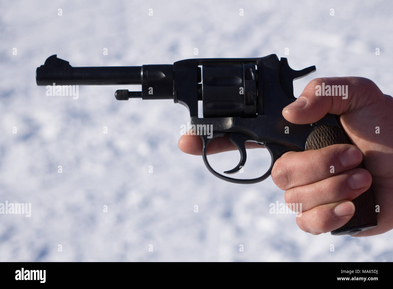 Men hand with revolver pistol isolated on a white background Stock ...