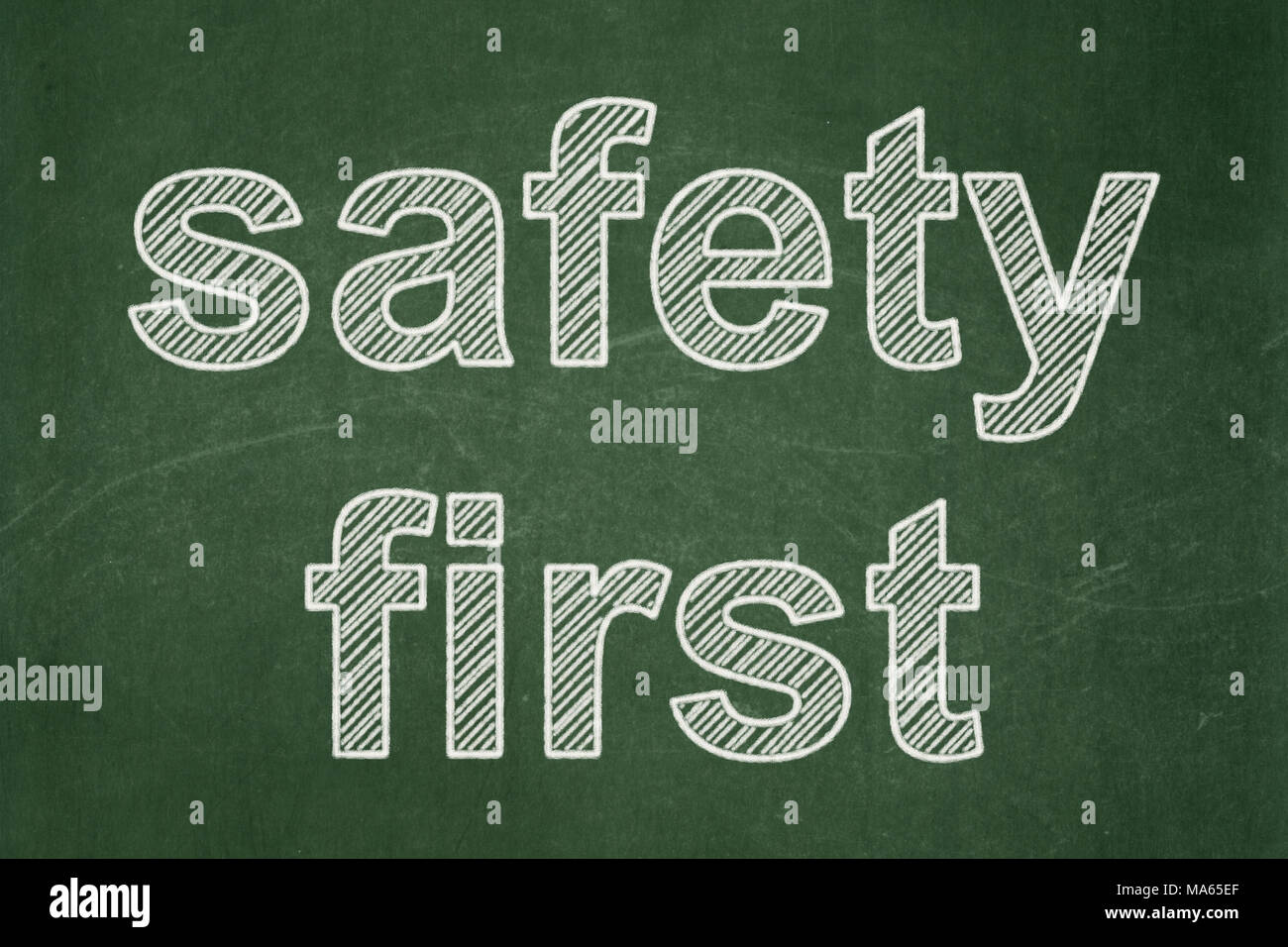 Protection concept: Safety First on chalkboard background Stock Photo - Alamy