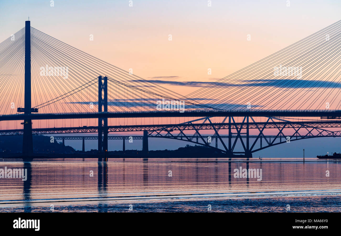 Sunrise view of the three major bridges crossing the Firth of Forth at ...