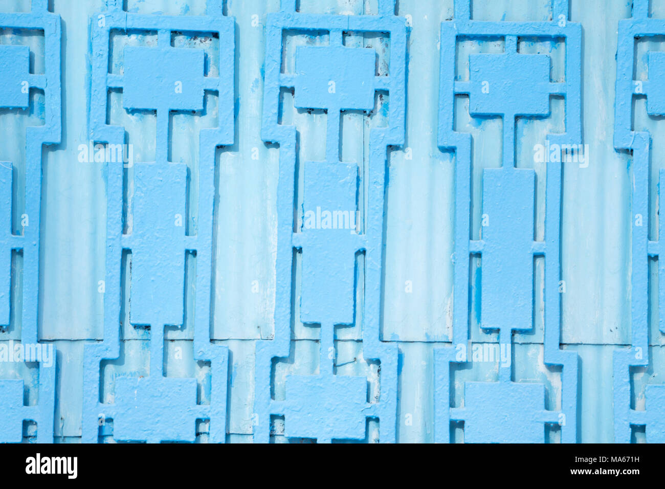 part of black wrought iron gates texture with golden colored pattern ...