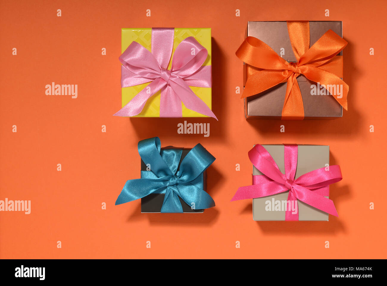 Gift box with tied ribbon bow Stock Photo - Alamy