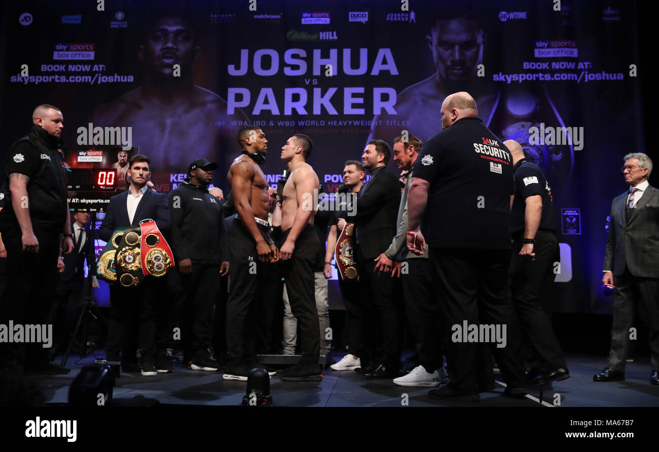 Anthony Joshua and Joseph Parker during the weigh in at the Motorpoint ...