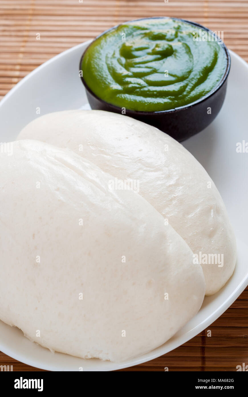 Close up of Mantou (Chinese steamed bun) with Thai pandan custard (Thai ...