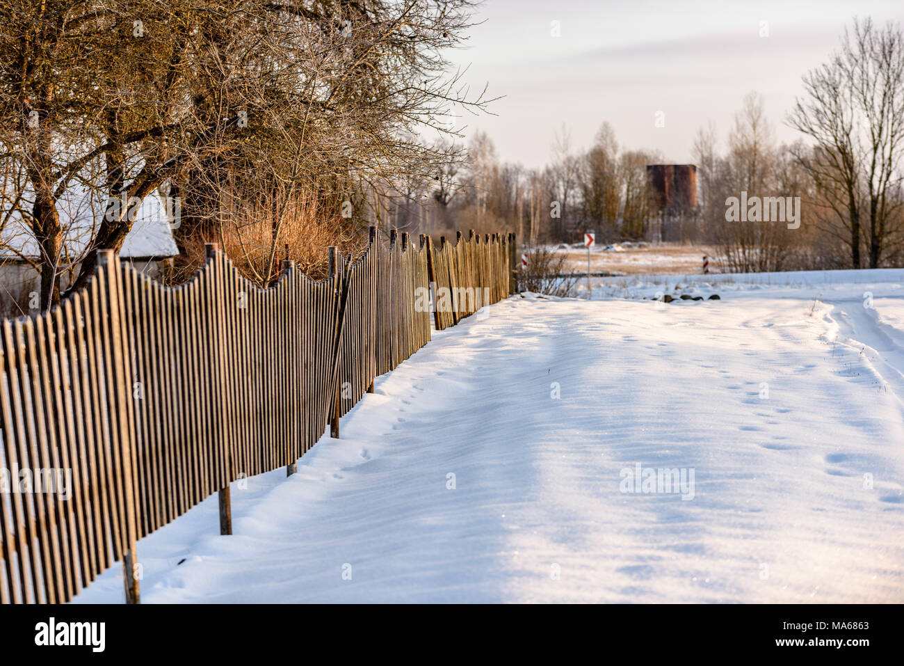 wooden plank fence details in countryside in winter time, with lots of ...