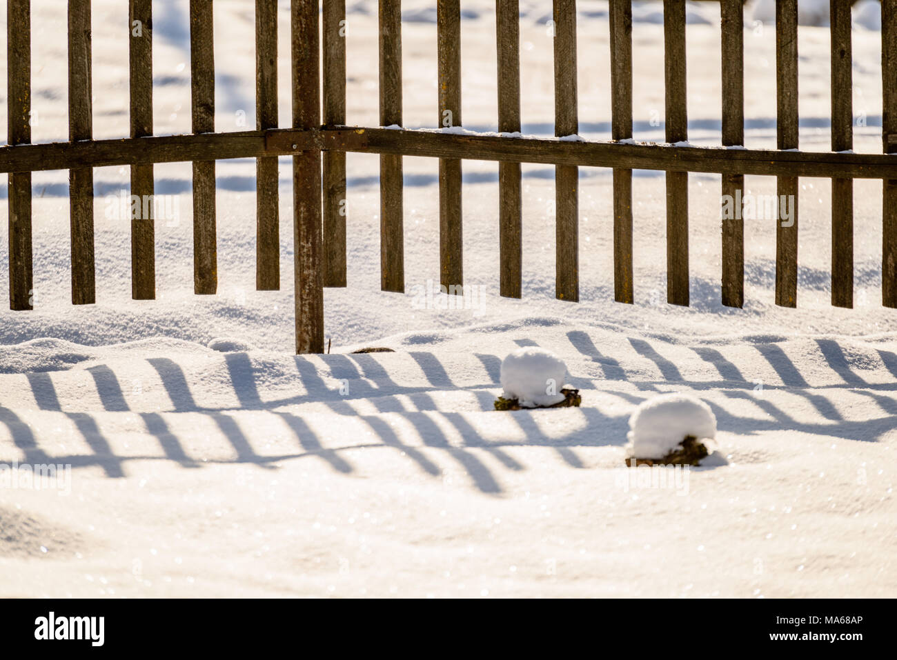 wooden plank fence details in countryside in winter time, with lots of ...