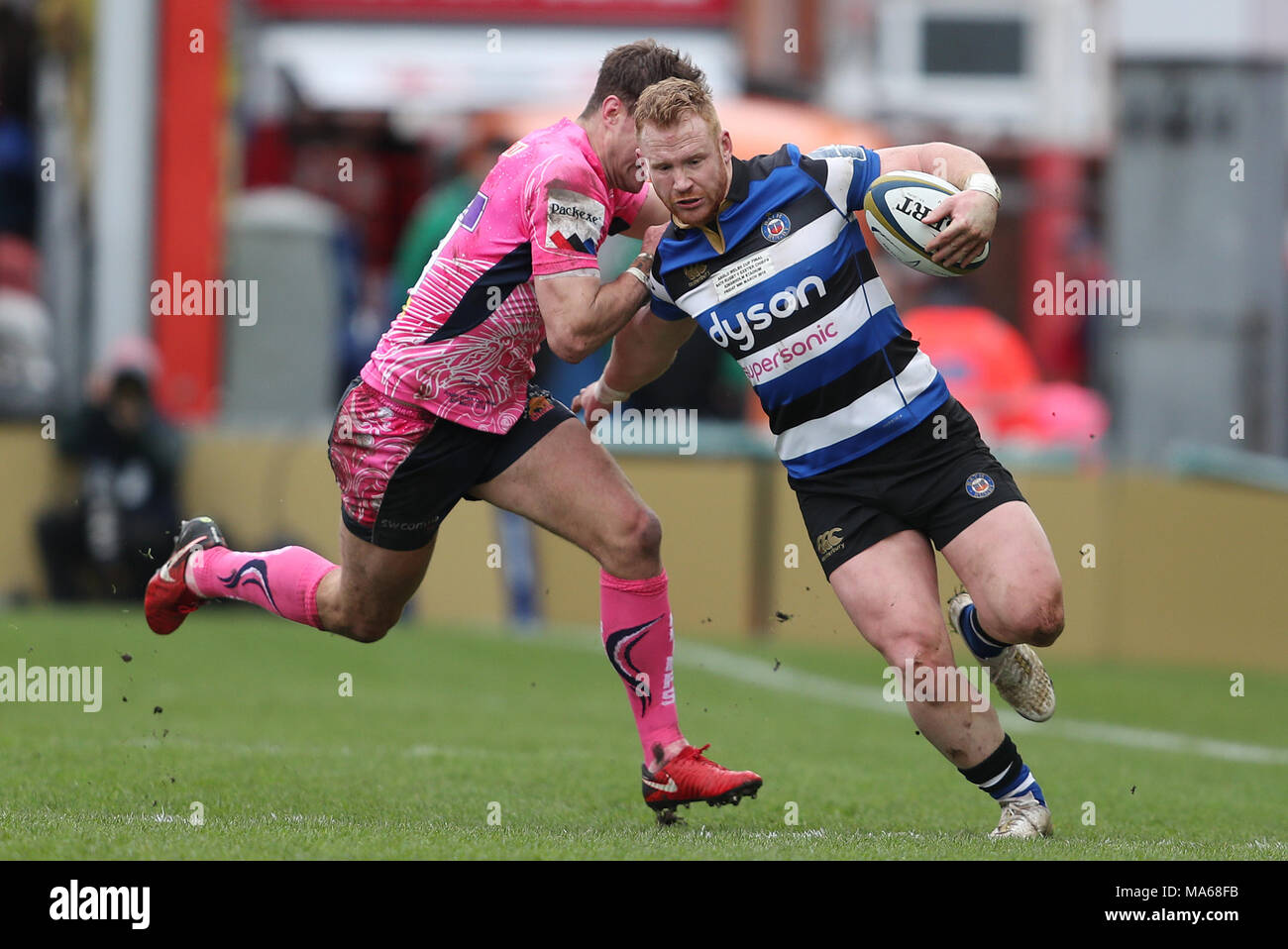 Bath's Will Hurrell is tackled by Exeter's Ollie Devoto during the ...