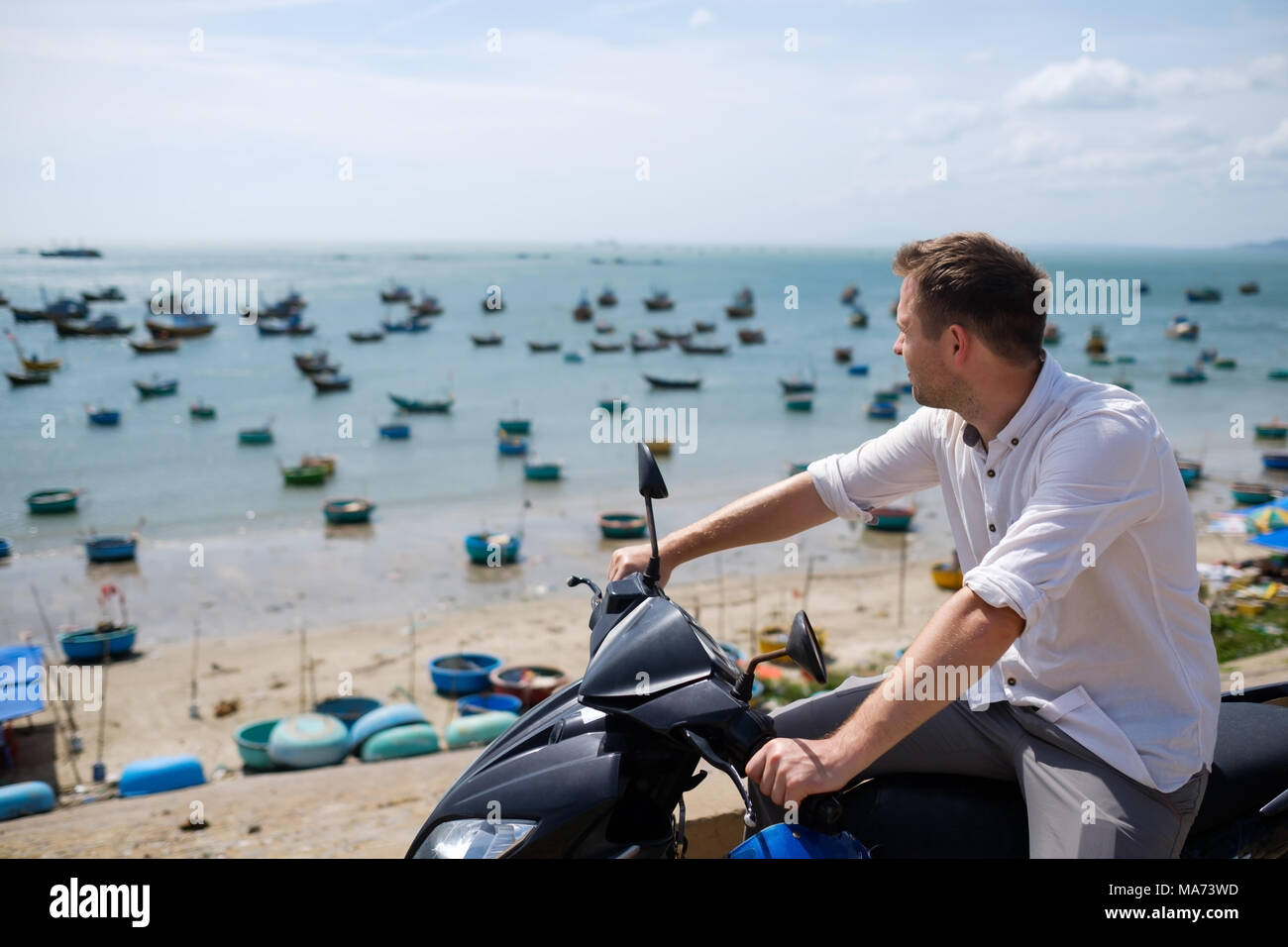 Without helmet hi-res stock photography and images - Alamy