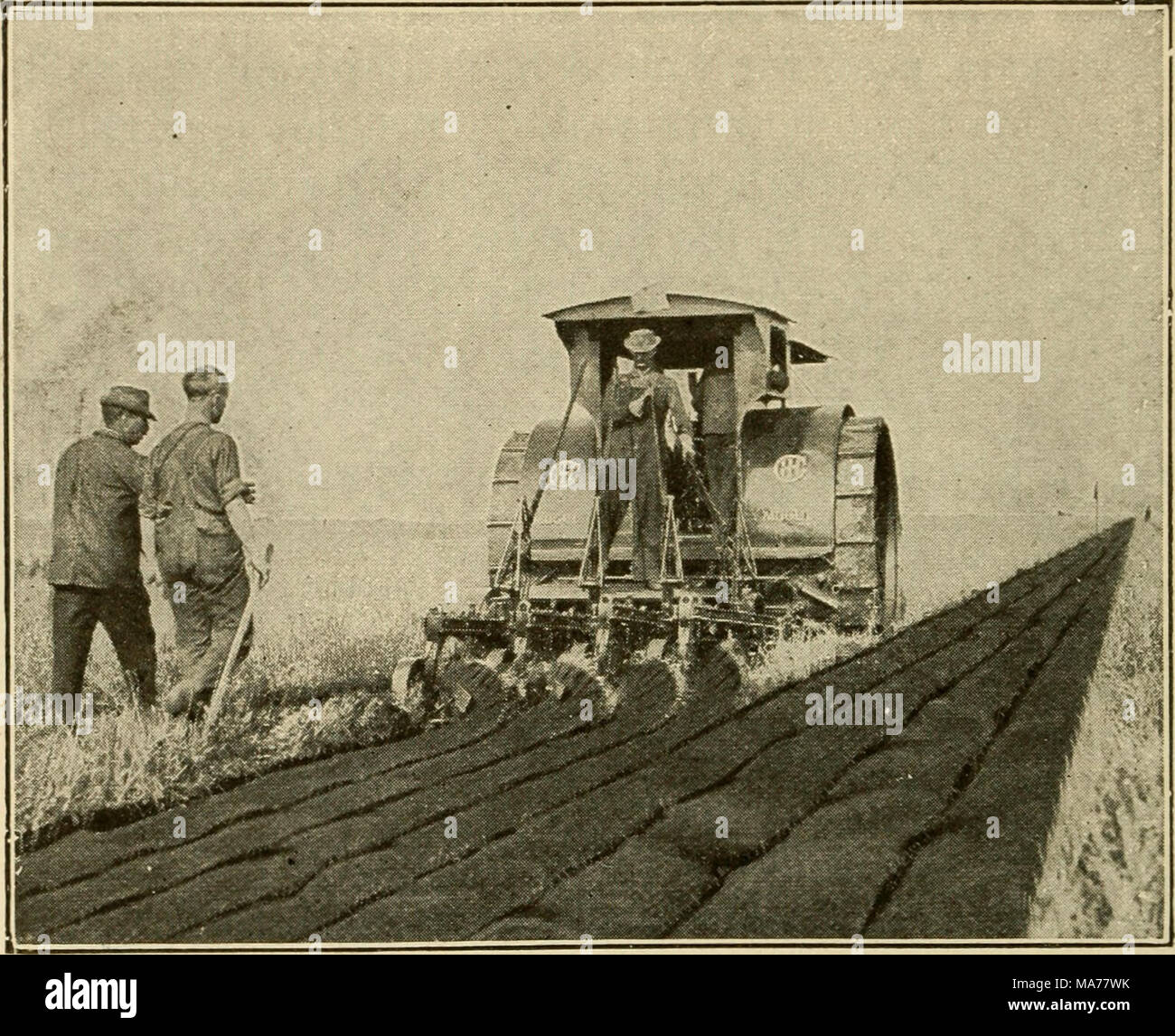 . Elementary agriculture . Fig. 58. A tractor engine drawing four ...