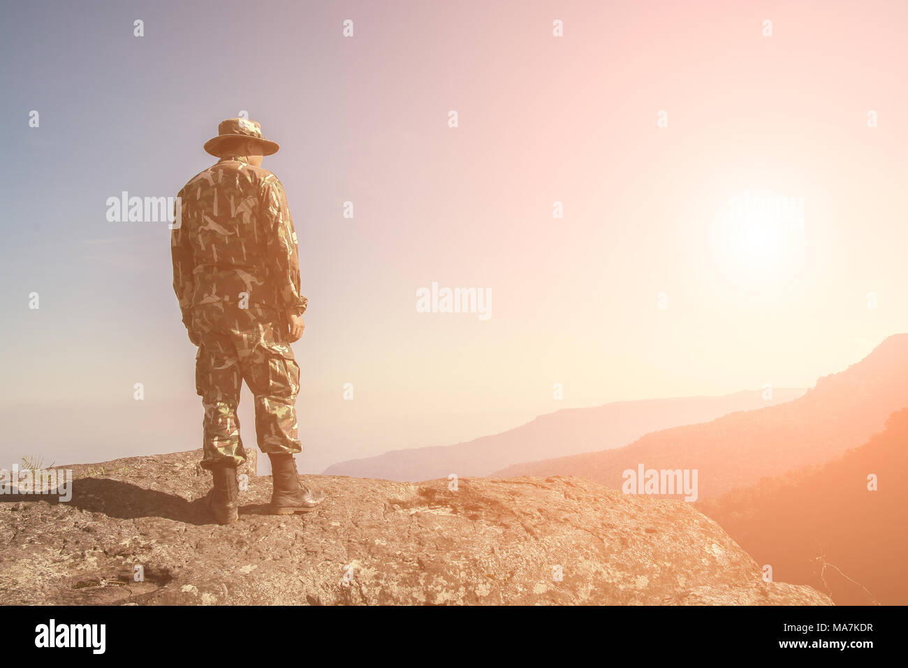 Soldier standing on mountain hi-res stock photography and images - Alamy