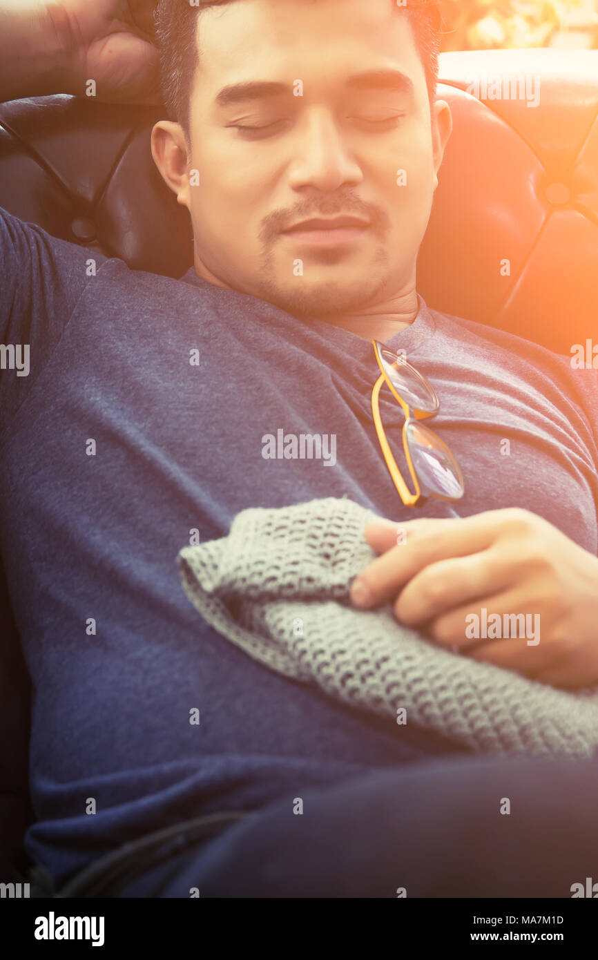 Man nap sofa hi-res stock photography and images - Alamy