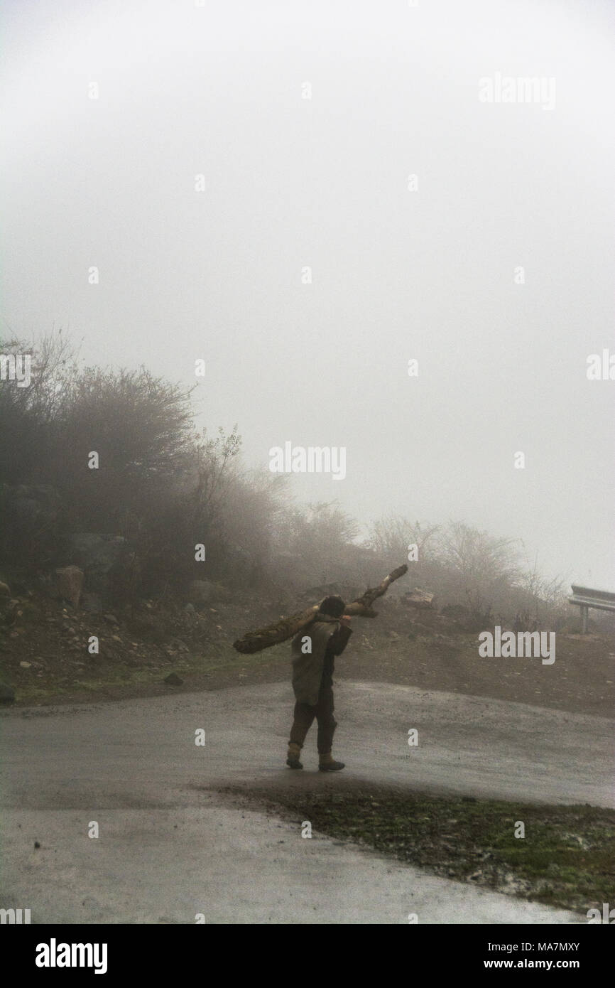 shepherd in rain Stock Photo - Alamy
