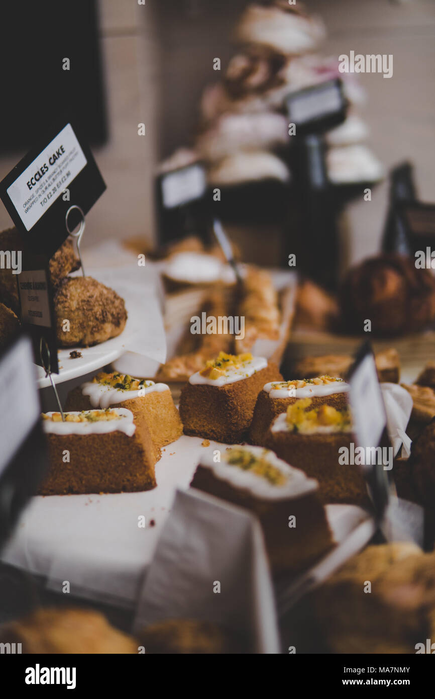 Homemade cakes in a shop display Stock Photo - Alamy