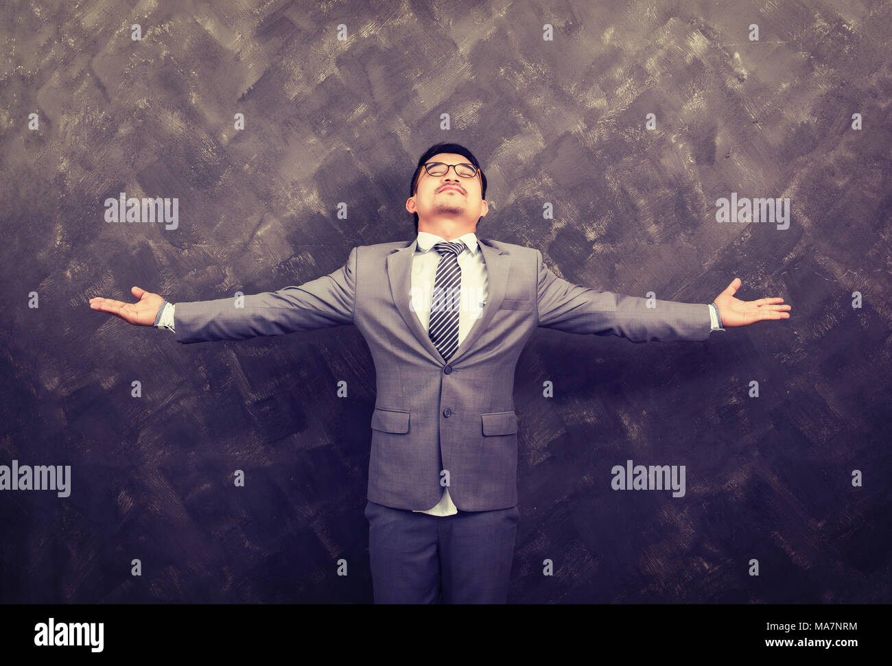Man stretching arms wide open hi-res stock photography and images - Alamy