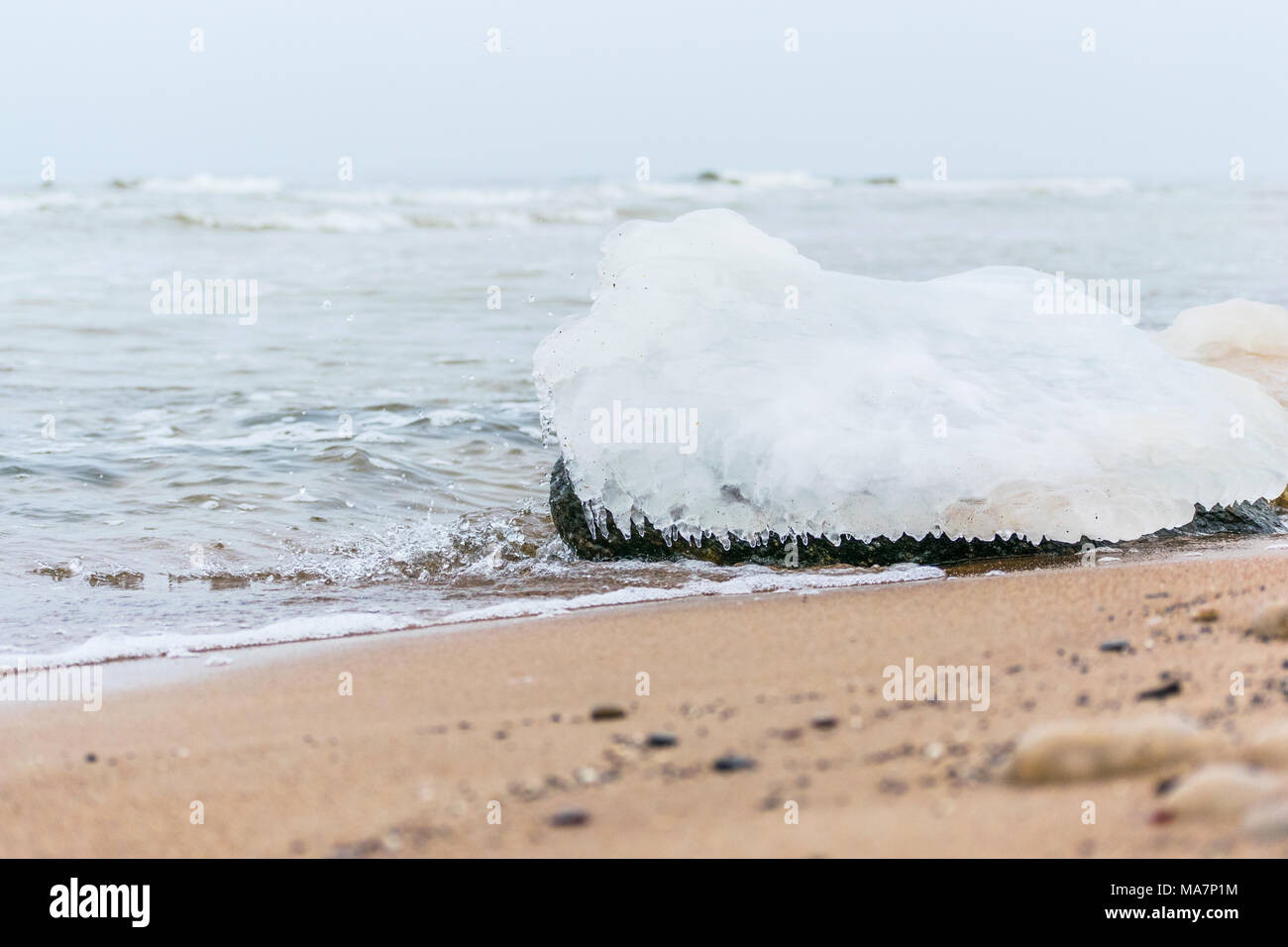 water splash on frozen stone Stock Photo - Alamy