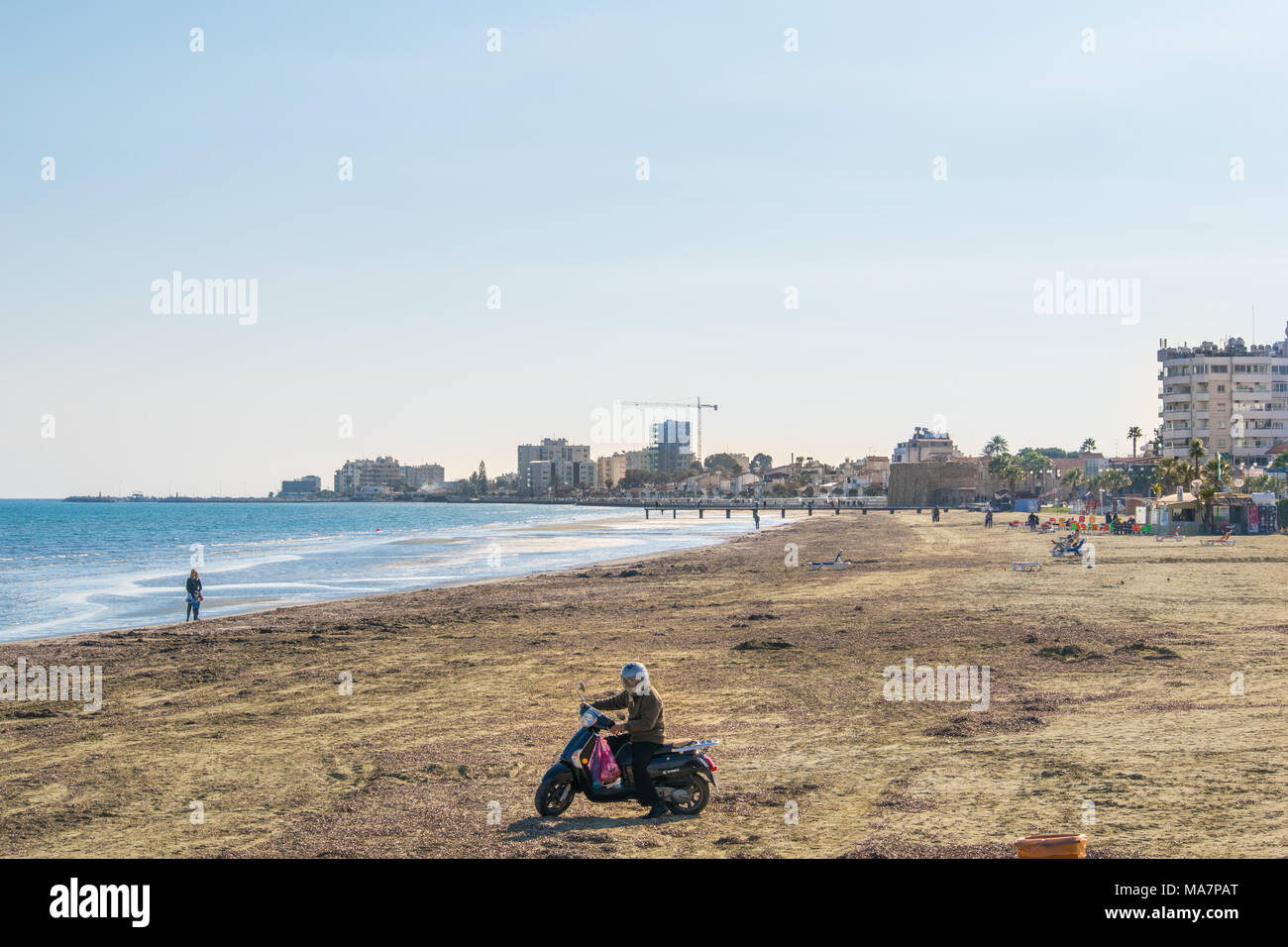 scooter on sea shore in Cyprus Larnaca Stock Photo - Alamy