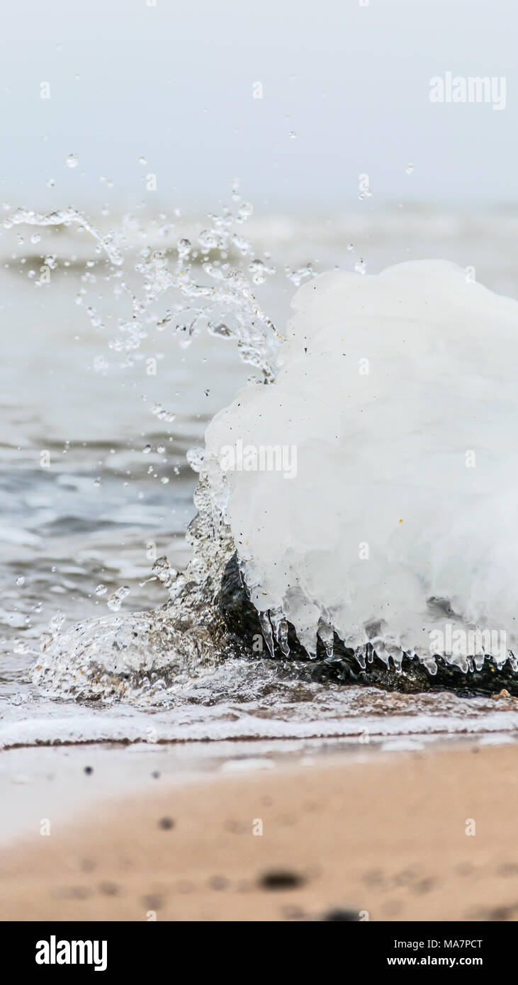water splash on frozen stone Stock Photo - Alamy
