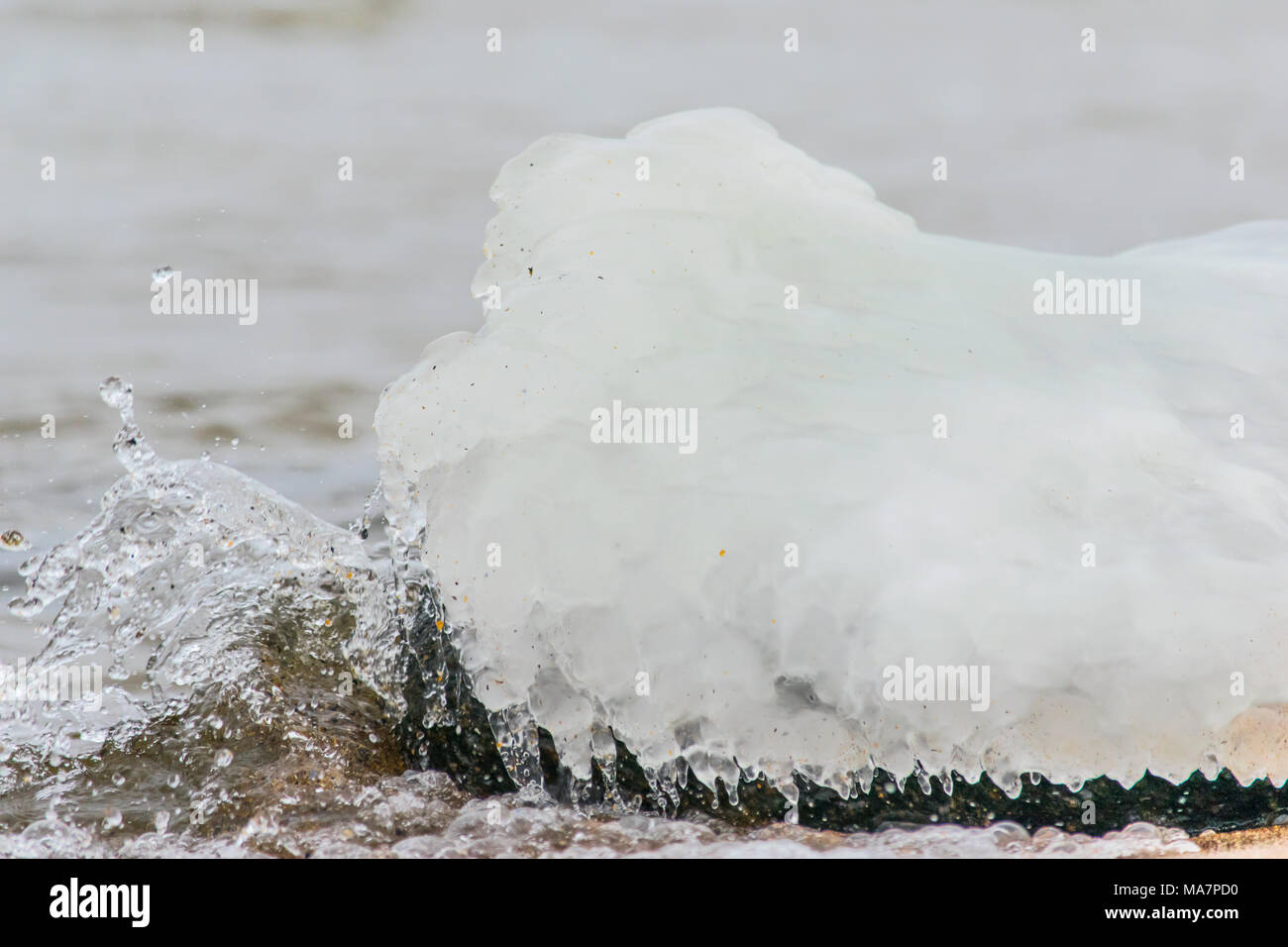 water splash on frozen stone Stock Photo - Alamy