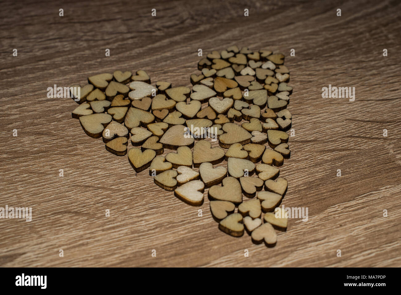 Heart shape in wood pile hi-res stock photography and images - Alamy
