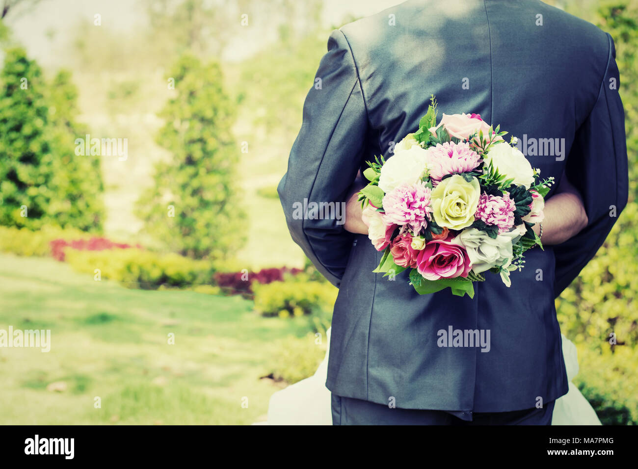 Bride hug groom and her hands holding bouquet in wedding party Stock ...