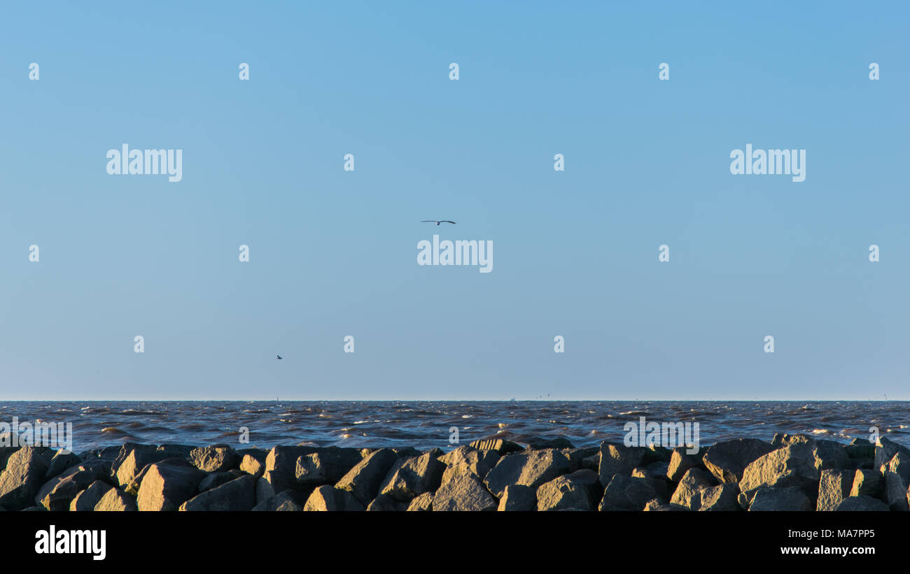 harbor stone barrier in klaipeda wave breaker Stock Photo - Alamy