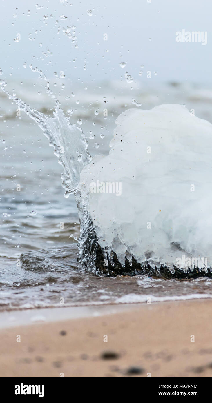 water splash on frozen stone Stock Photo - Alamy