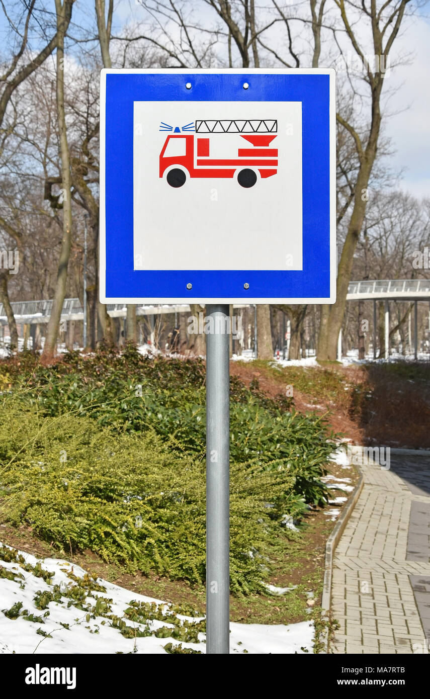 Firefighter truck parking lot sign Stock Photo - Alamy