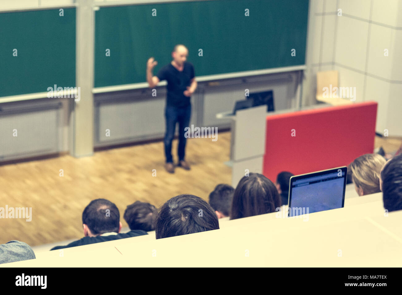 Taking notes during a lecture hi-res stock photography and images - Alamy
