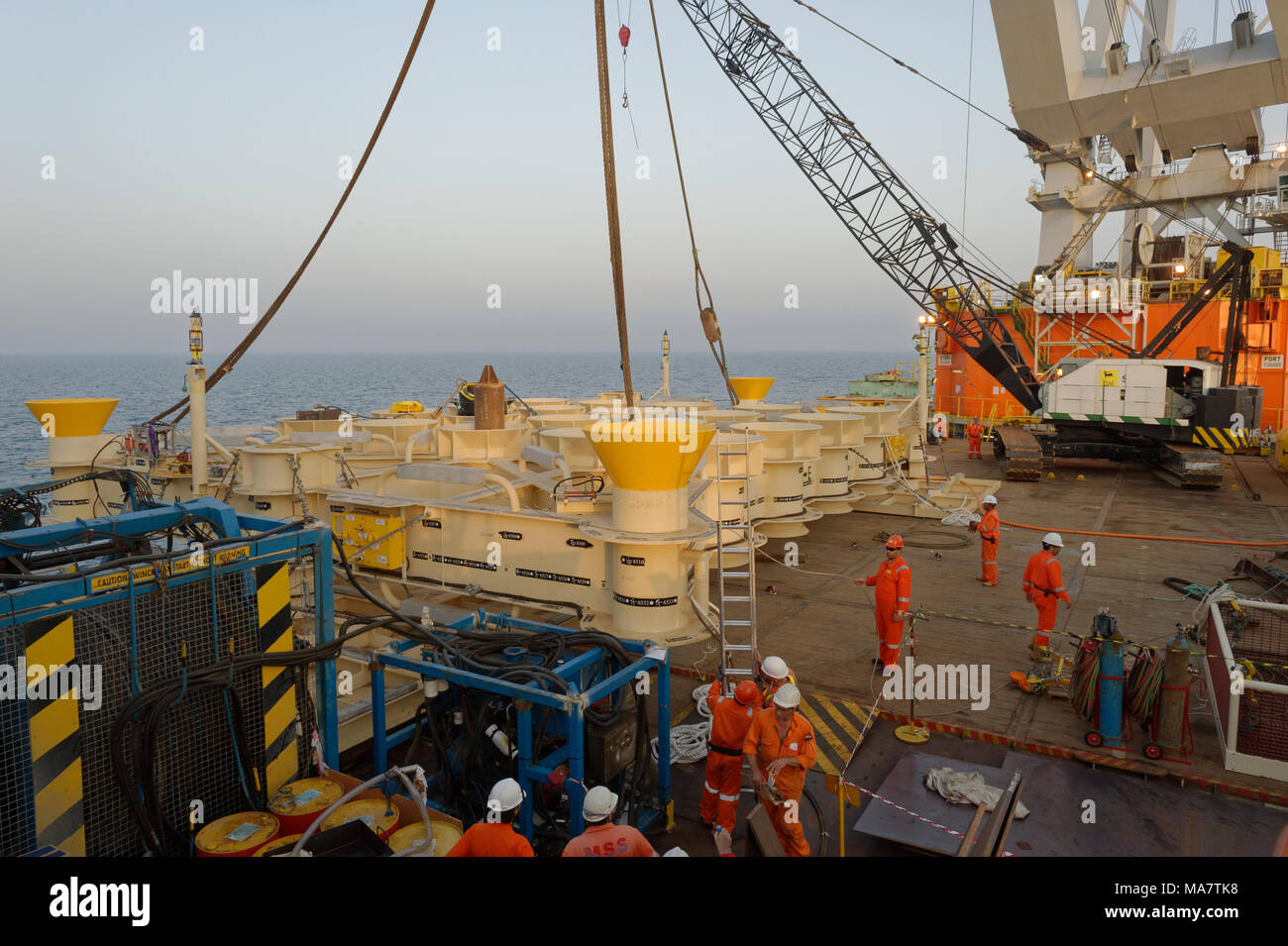 A subsea drilling template on the deck of the DBA is prepared for ...