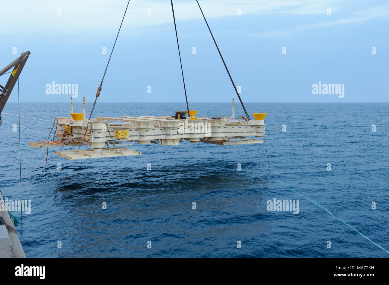 A subsea drilling template is lifted from the DBA in the Caspian Sea ...