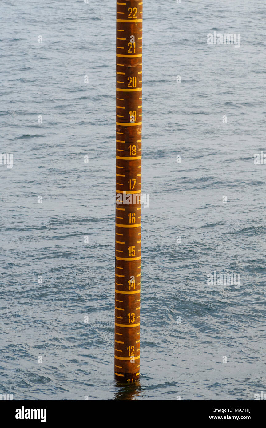 A subsea pile being lowered to the seabed in preparation for piling of ...