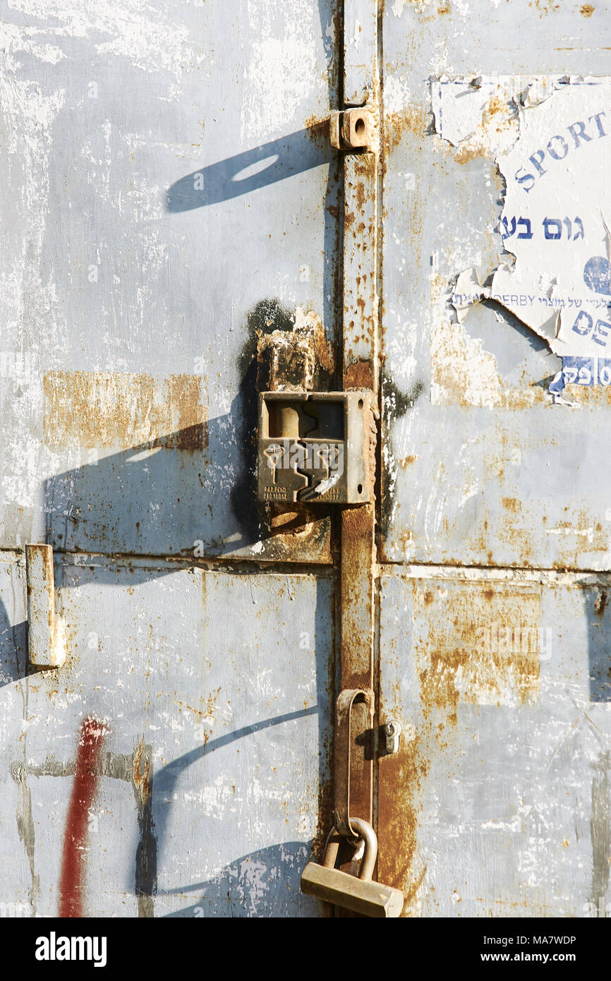 store owner having a smoke outside his stall Stock Photo - Alamy