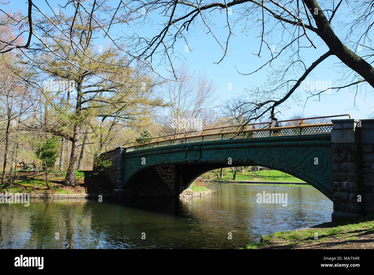 Lullwater Bridge crosses Lullwater during spring in Prospect Park ...