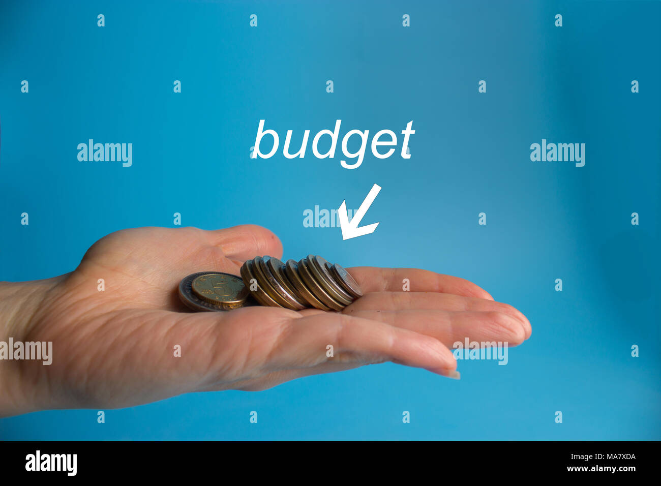 A bunch of small coins. small budget concept Stock Photo - Alamy
