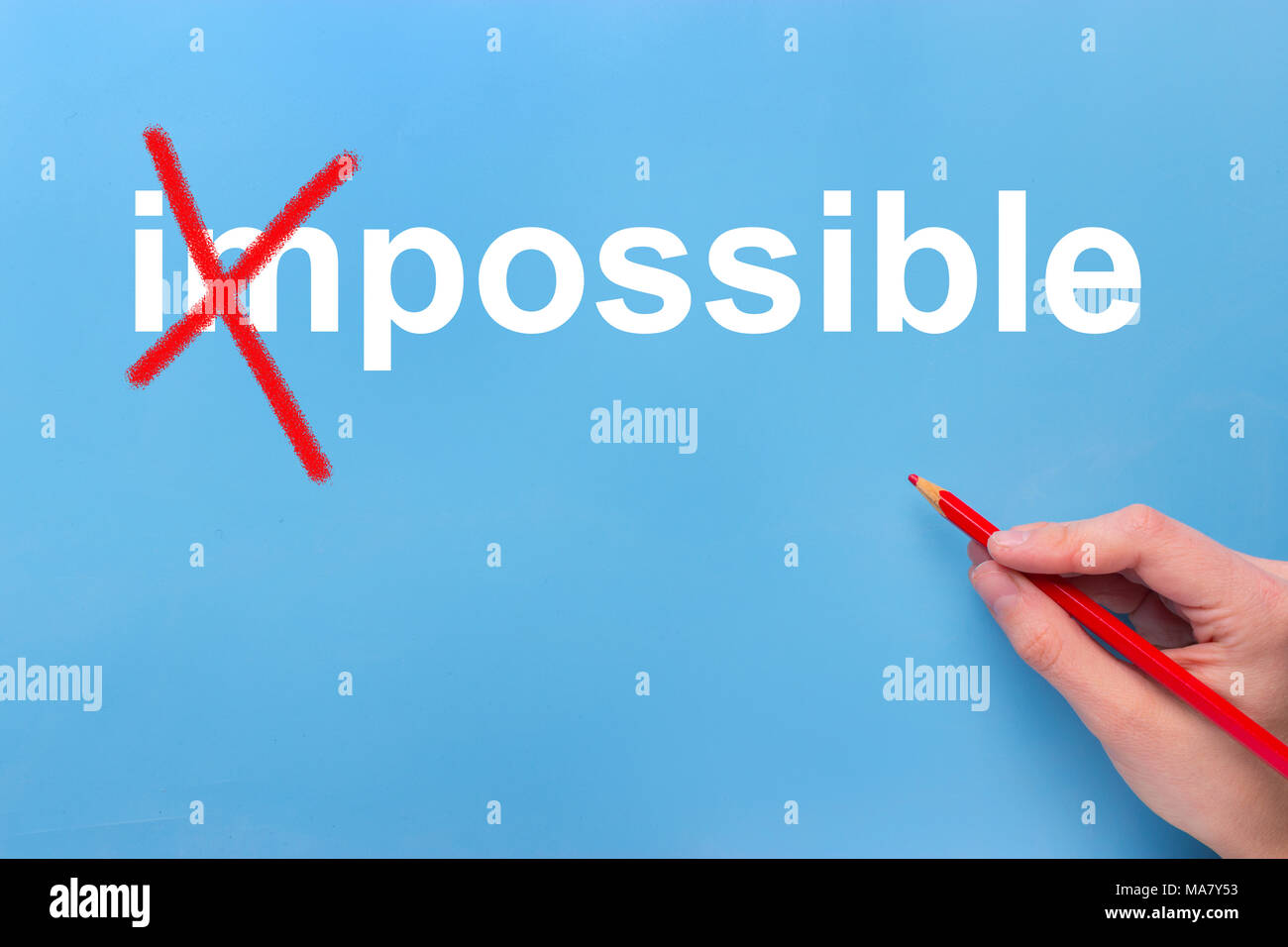 Impossible Unbelievable Hand Cross Word Split Concept Stock Photo - Alamy